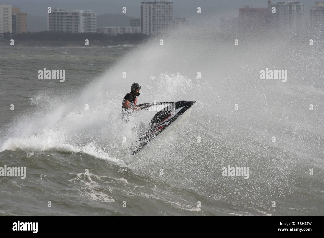 JET SKI RIDERS PERFORMING TRICKS IN BIG WAVES SUNSHINE COAST QUEENSLAND ...