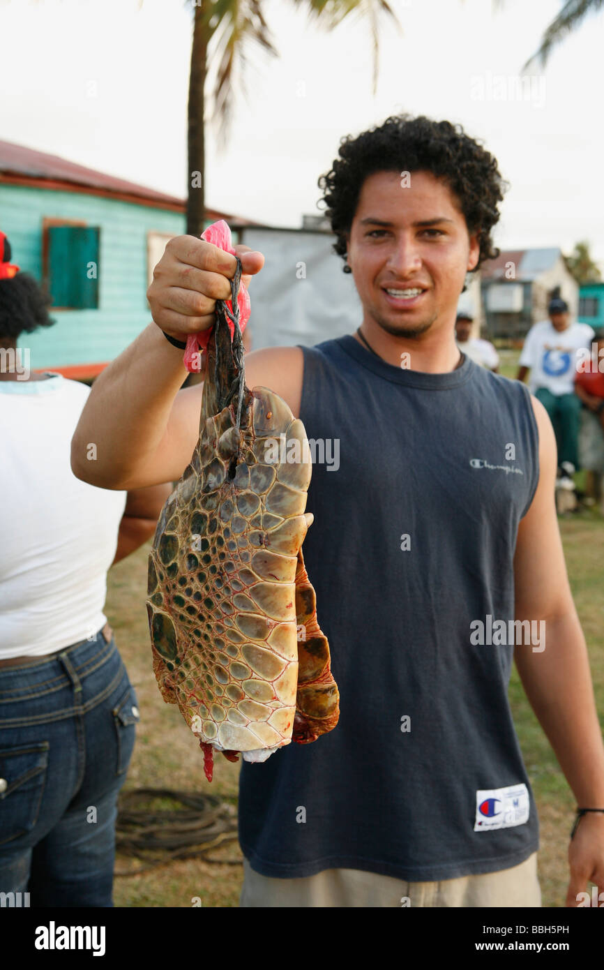 Tasbapauni, Nicaragua; Man holding turtle flippers Stock Photo - Alamy