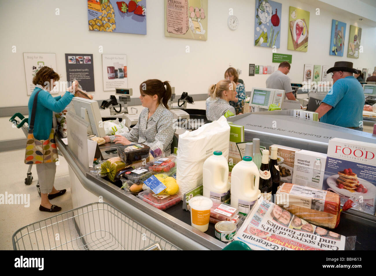 Customers at the Checkout at a Waitrose supermarket at Wallingford ...
