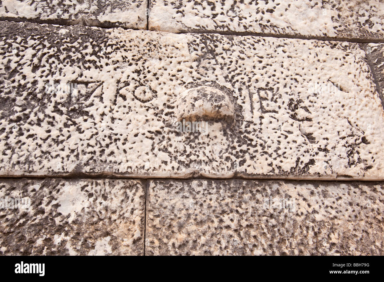 Stone markers on a stone block at the ancient Temple of Apollo at ...