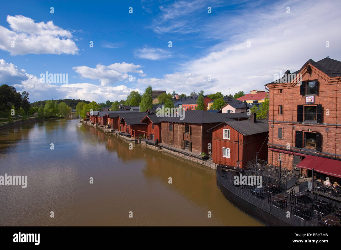 Traditional wooden architecture by riverside in historic Old Town in ...