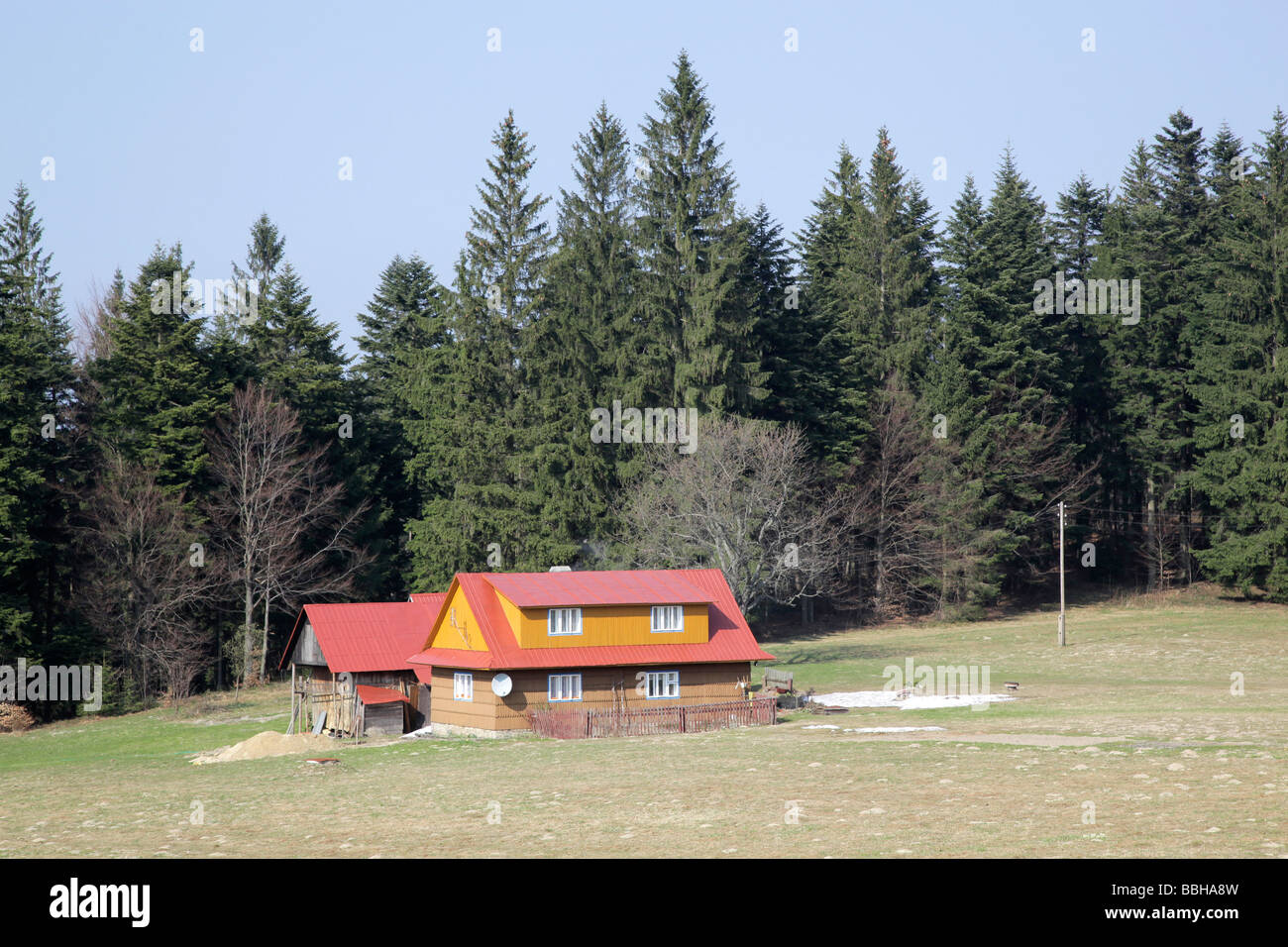 Cottage and barn near forest Stock Photo - Alamy