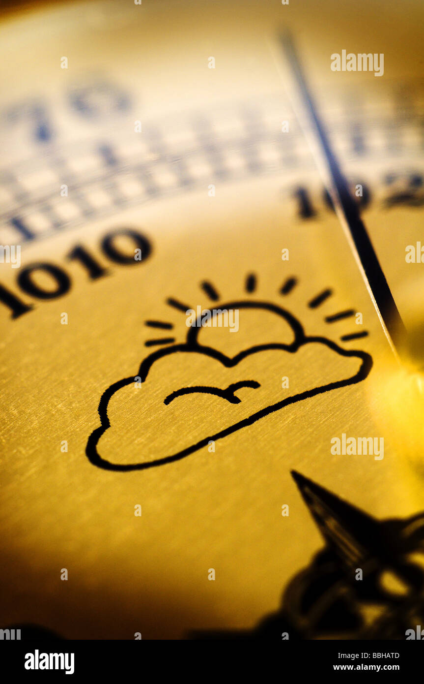 Symbol of cloudy weather on an old barometer Stock Photo - Alamy