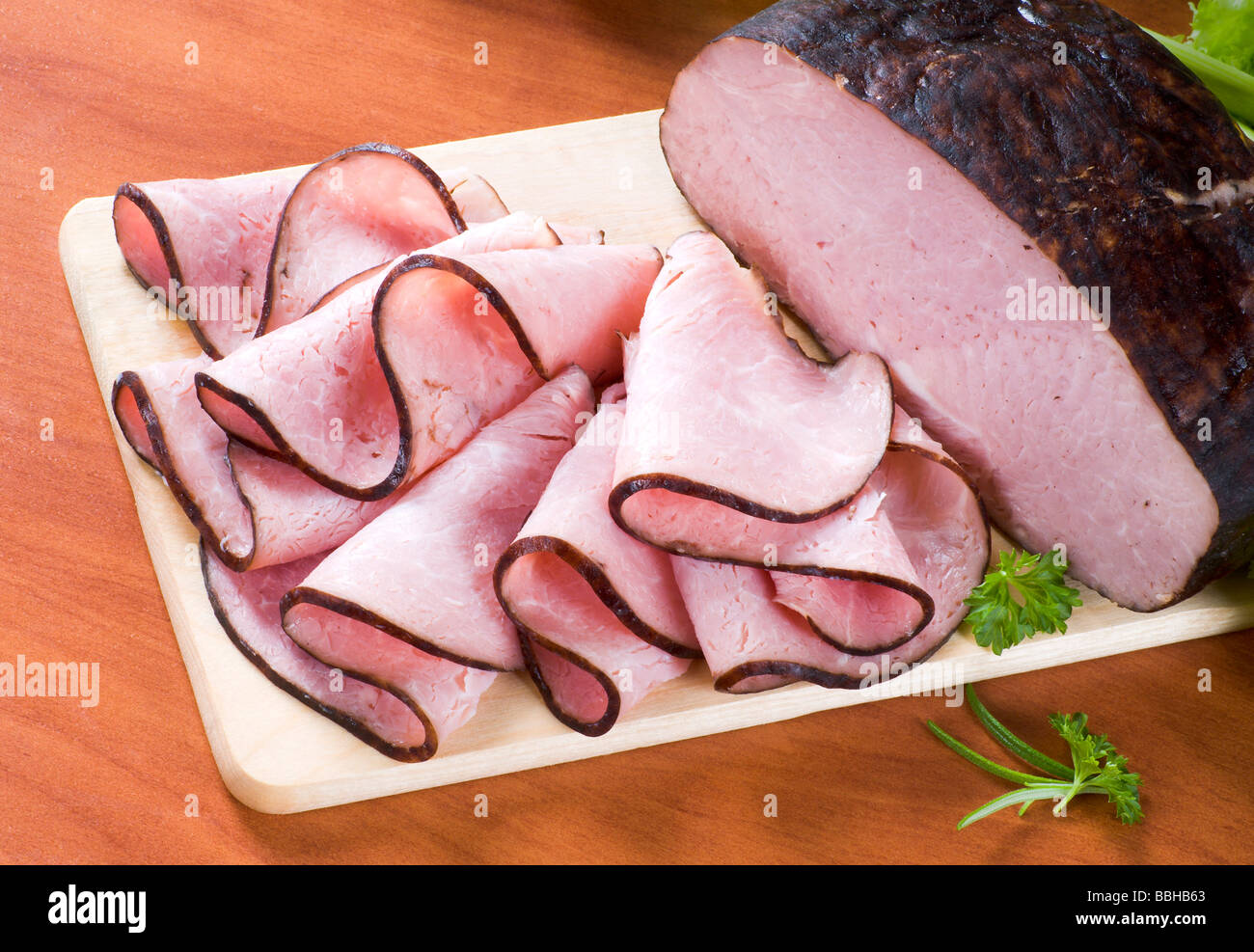 Slices of smoked ham Stock Photo - Alamy
