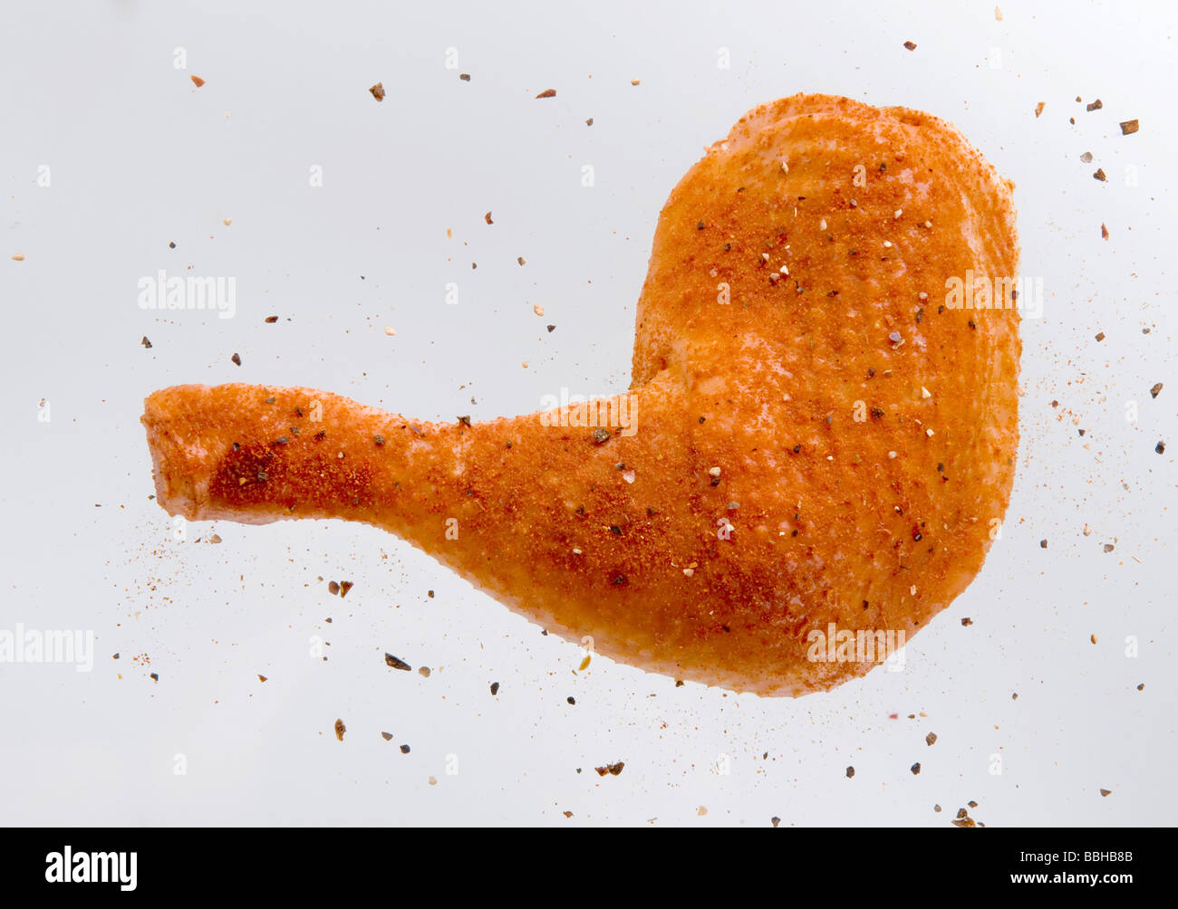 Spiced chicken leg Stock Photo - Alamy