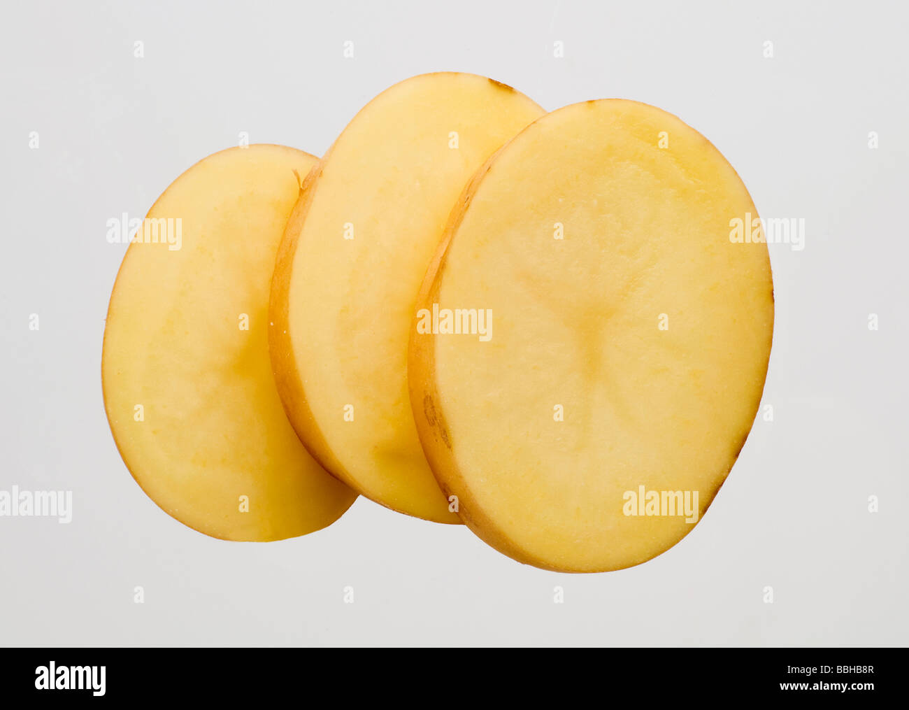 Potato slices raw hi-res stock photography and images - Alamy