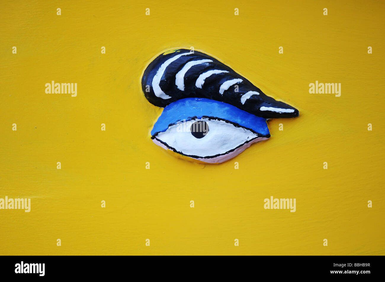 Plaster Eye on a wall Stock Photo - Alamy