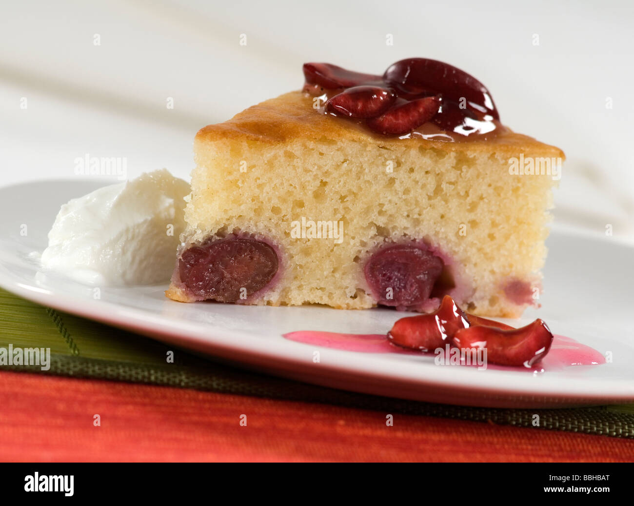 Cherry sponge cake Stock Photo - Alamy