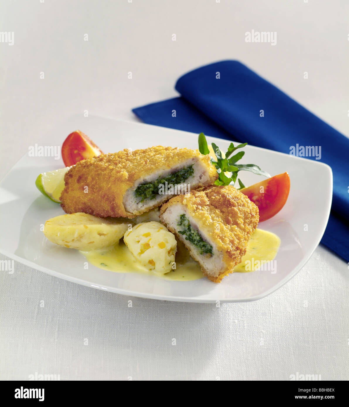 Fried chicken nuggets stuffed with spinach Stock Photo - Alamy