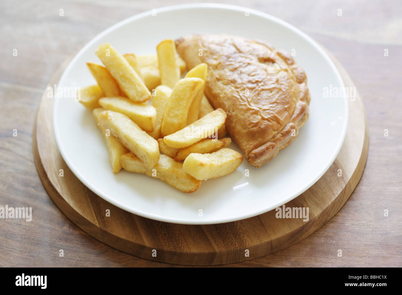 Pasty with Chips Stock Photo - Alamy