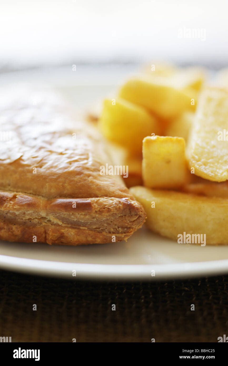 Pasty with Chips Stock Photo - Alamy