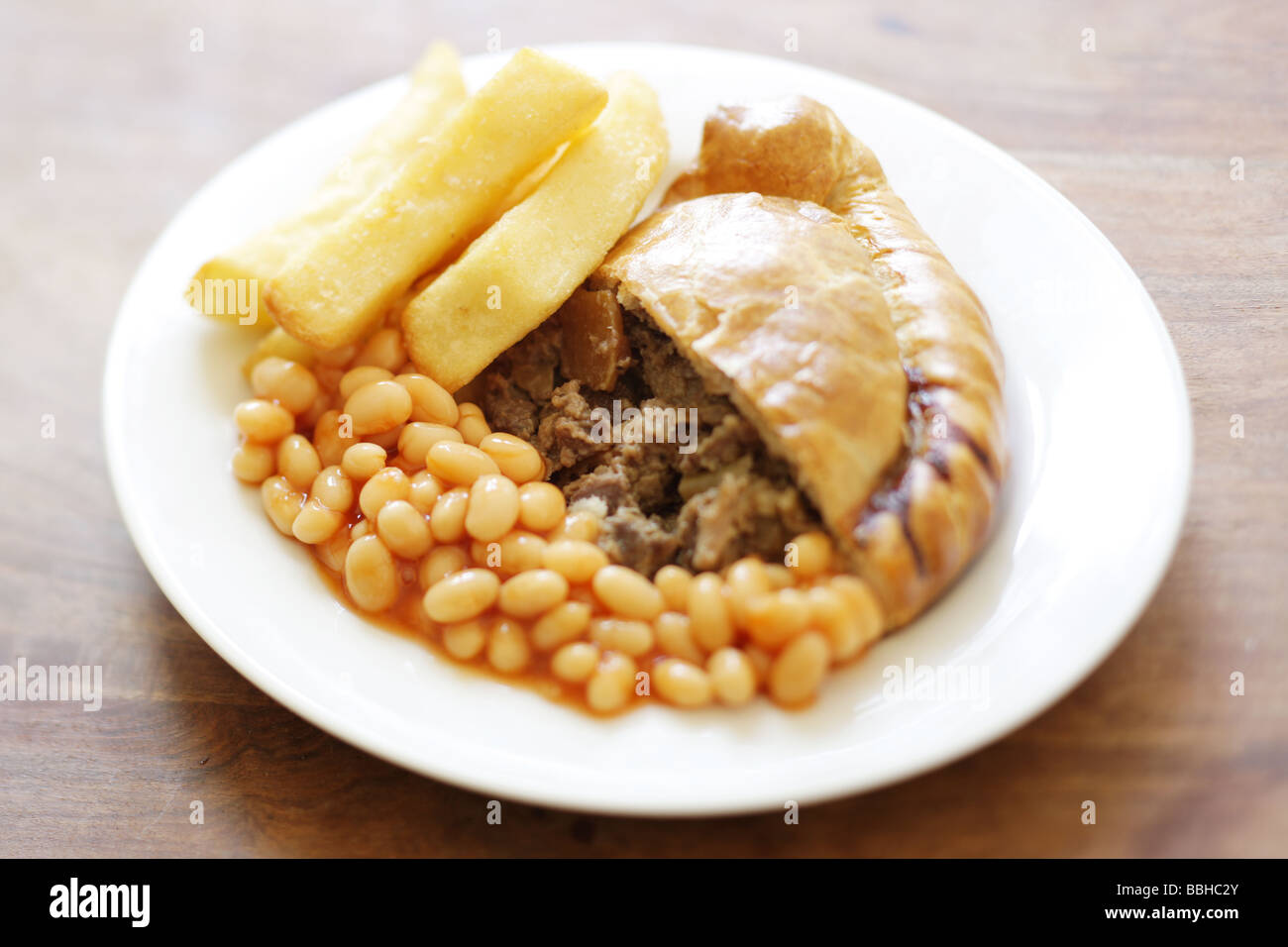 Authentic Cornish Pasty Filled With Meat and Vegetables with Chips and ...