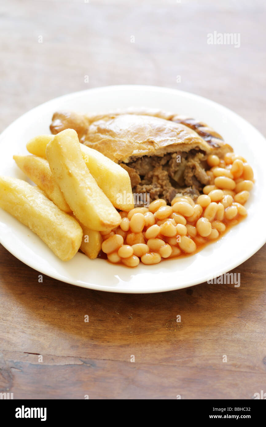 Authentic Cornish Pasty Filled With Meat and Vegetables with Chips and ...