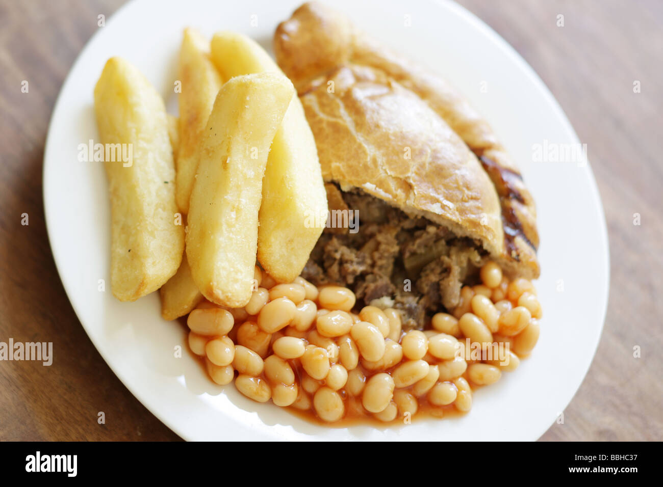 Authentic Cornish Pasty Filled With Meat and Vegetables with Chips and ...