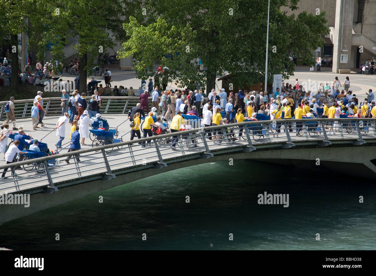 The faithful and infirmed are taken for a procession in Lourdes France ...