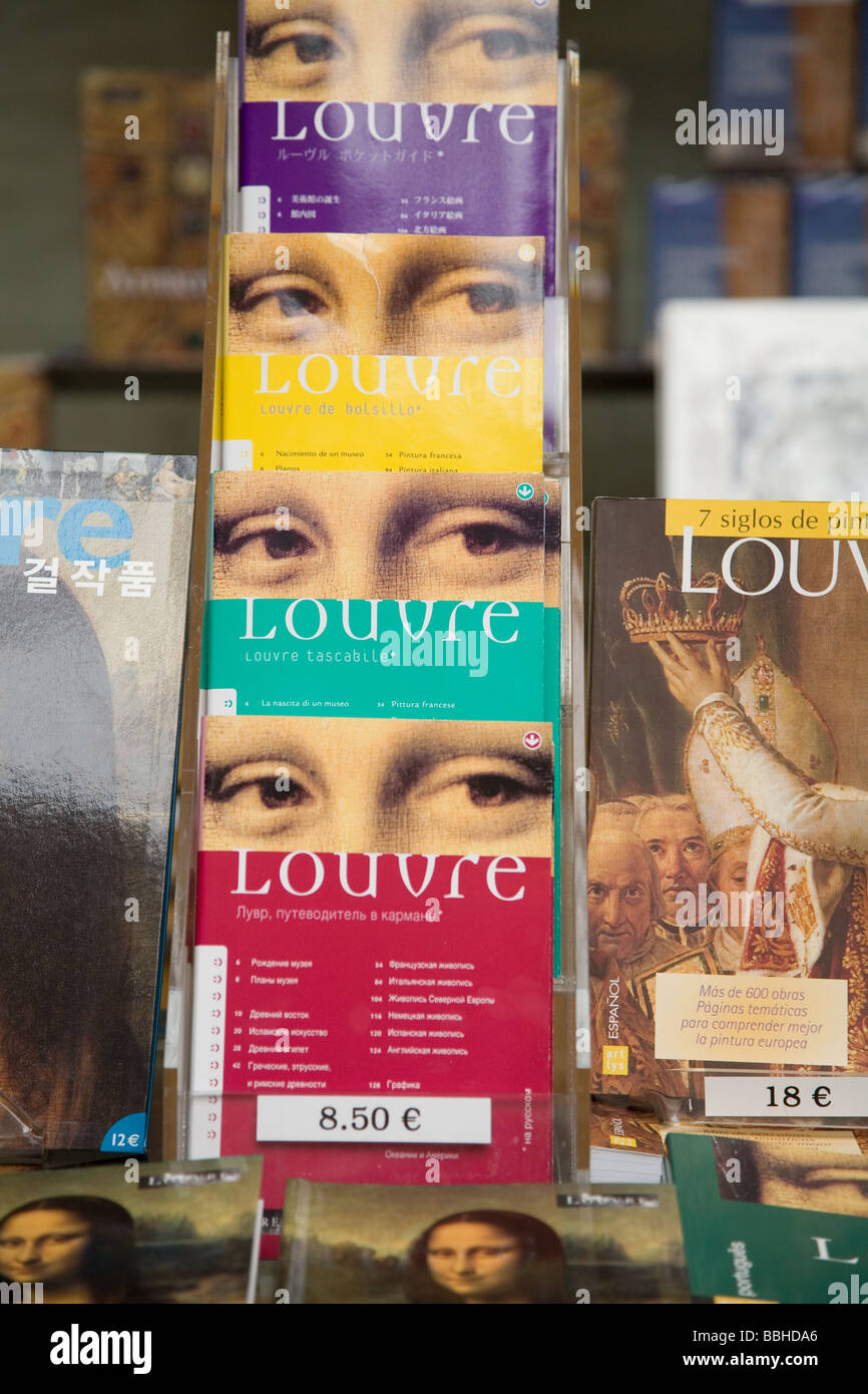 Guide books on sale at Musee du Louvre in Paris France Stock Photo - Alamy