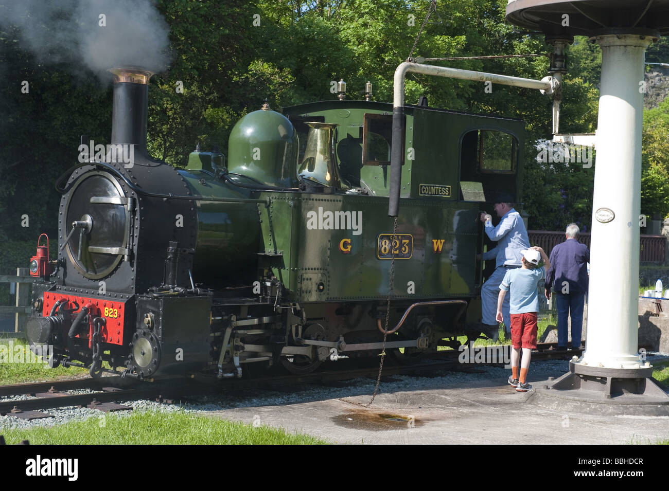 Young boy follows steam engine driver into The Countess steam engine on ...