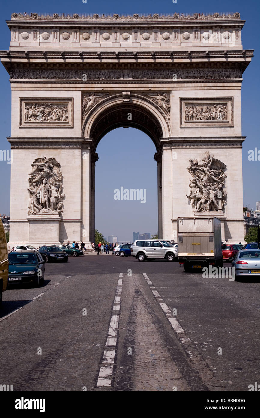 Traffic continually speeds around the Arc de Triomphe in Paris France ...