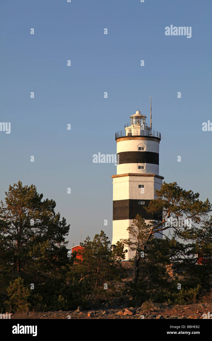 lighthouse with forest Stock Photo - Alamy