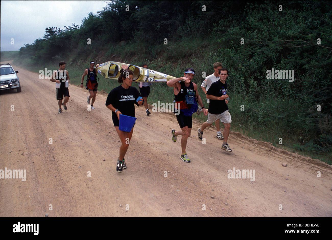 Martin Dreyer and Rory Cole portaging on the non stop Dusi Canoe ...