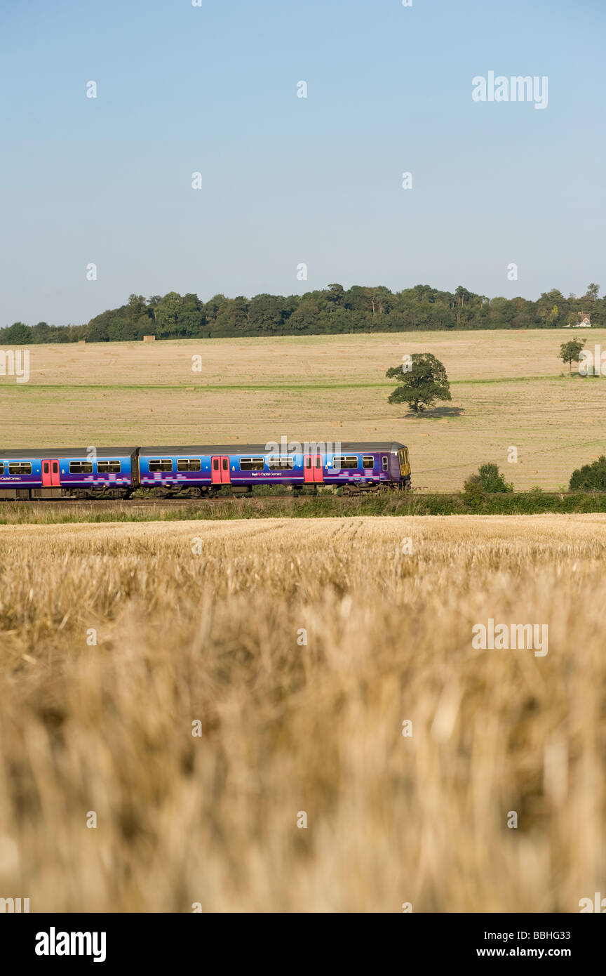 Passenger train class 319 in First Capital Connect livery speeding ...
