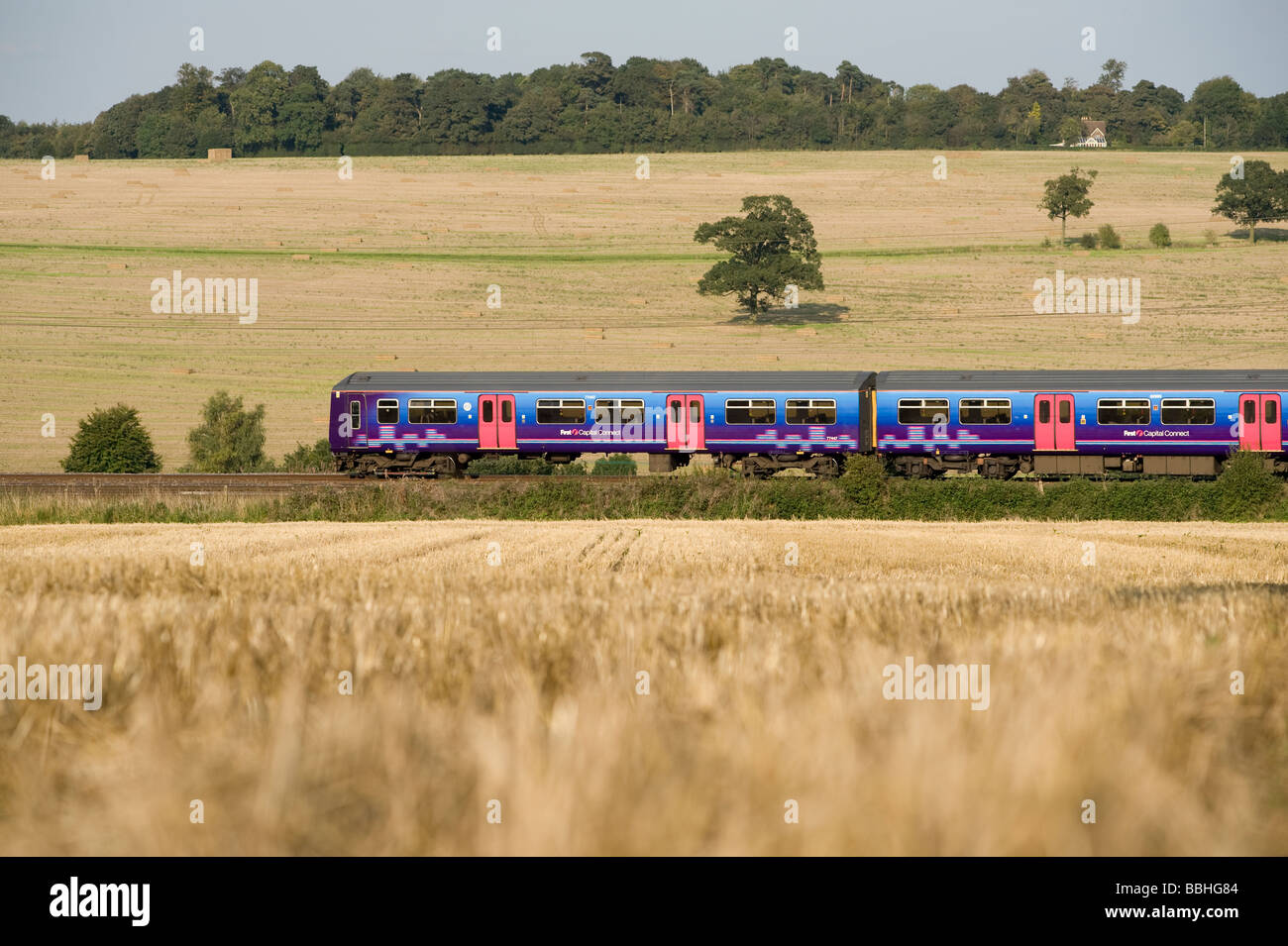 Passenger train class 319 in First Capital Connect livery speeding ...