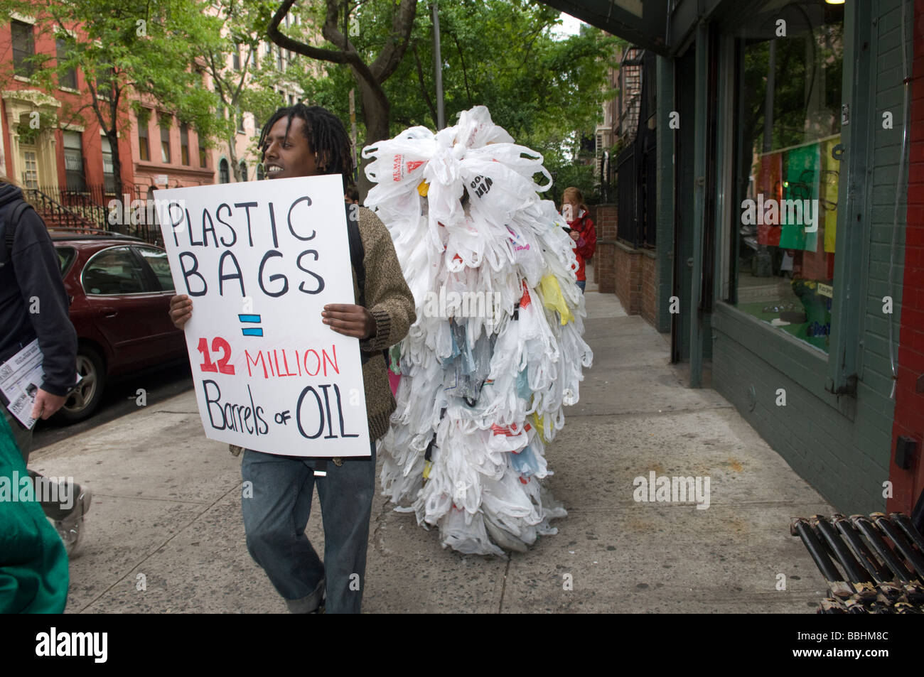 The Plastic Bag Monster marches through the streets of the East Village ...
