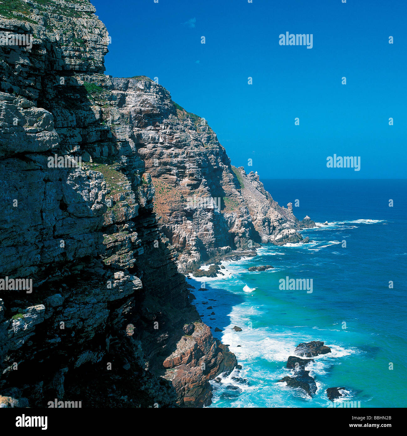 TOWERING CLIFFS RISE MAJESTICALLY FROM AN AZURE OCEAN Stock Photo - Alamy