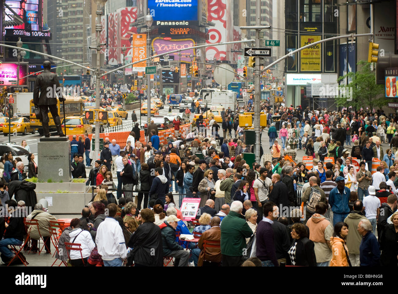 Pedestrians take advantage of a the new traffic patterns in Times ...
