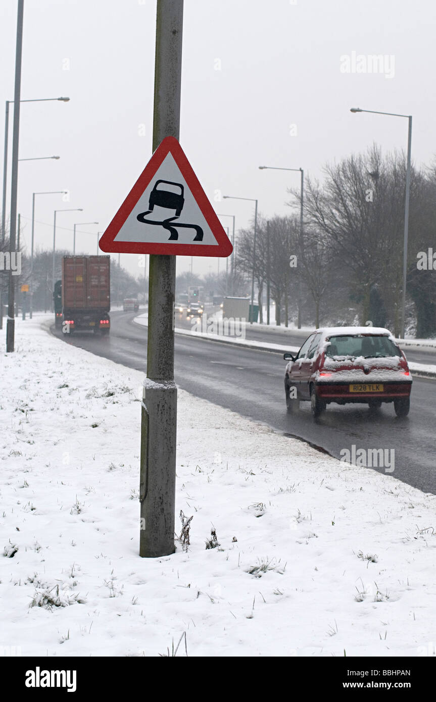 a slippery road sign in snow wolverhampton new road dudley Stock Photo ...