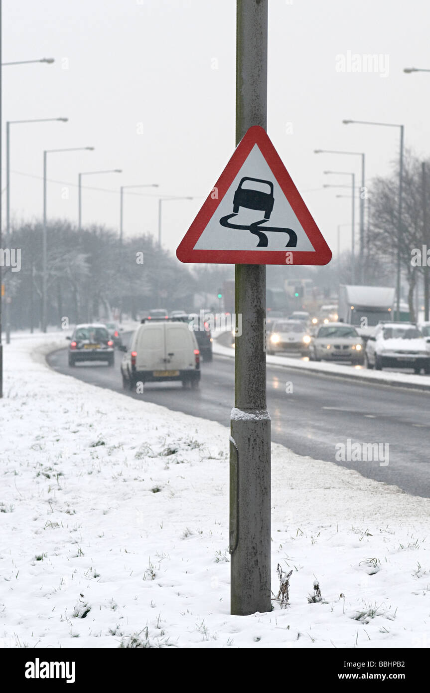 a slippery road sign in snow wolverhampton new road dudley Stock Photo ...