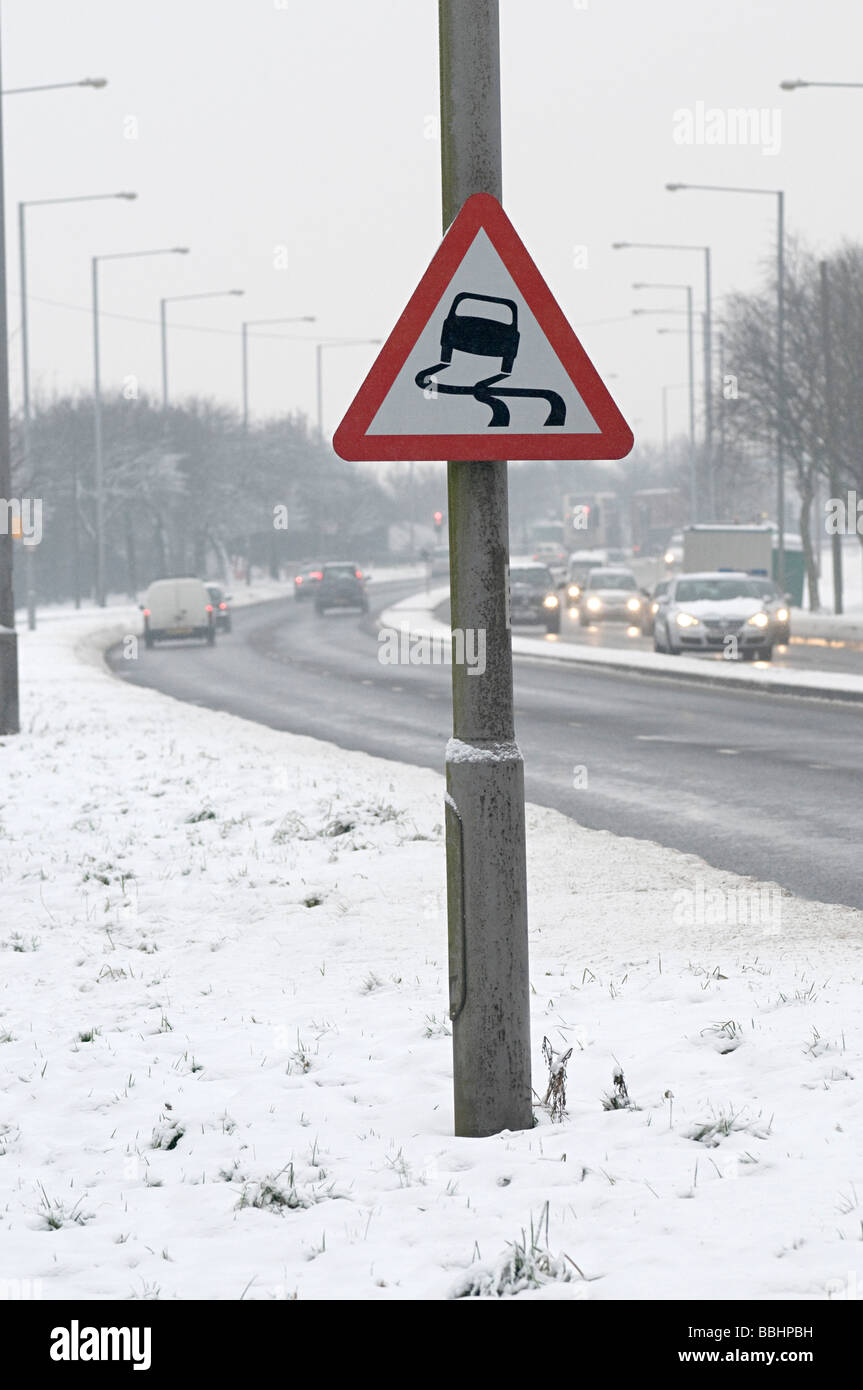 a slippery road sign in snow wolverhampton new road dudley Stock Photo ...