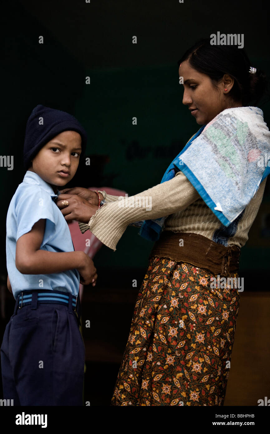 Child getting dressed uniform hi-res stock photography and images - Alamy
