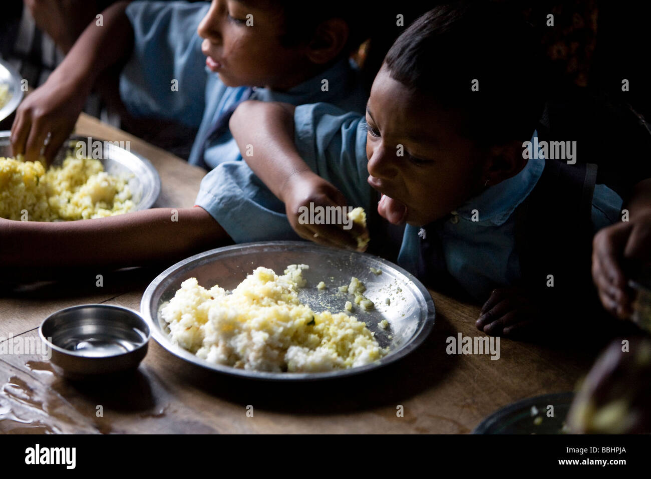 Pokhara, Nepal; Orphans eating breakfast before school Stock Photo - Alamy