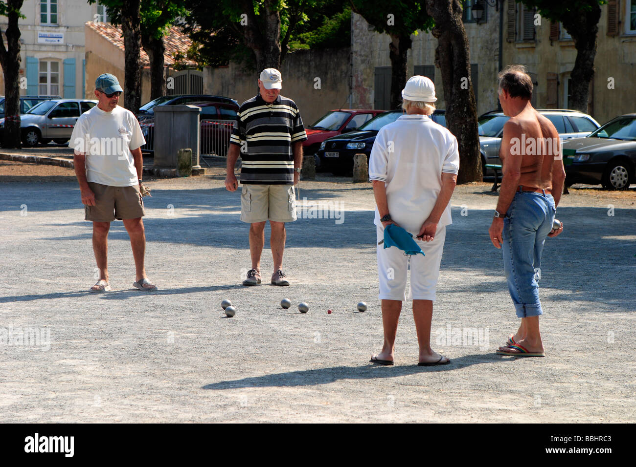 People playing boule in French village Stock Photo - Alamy