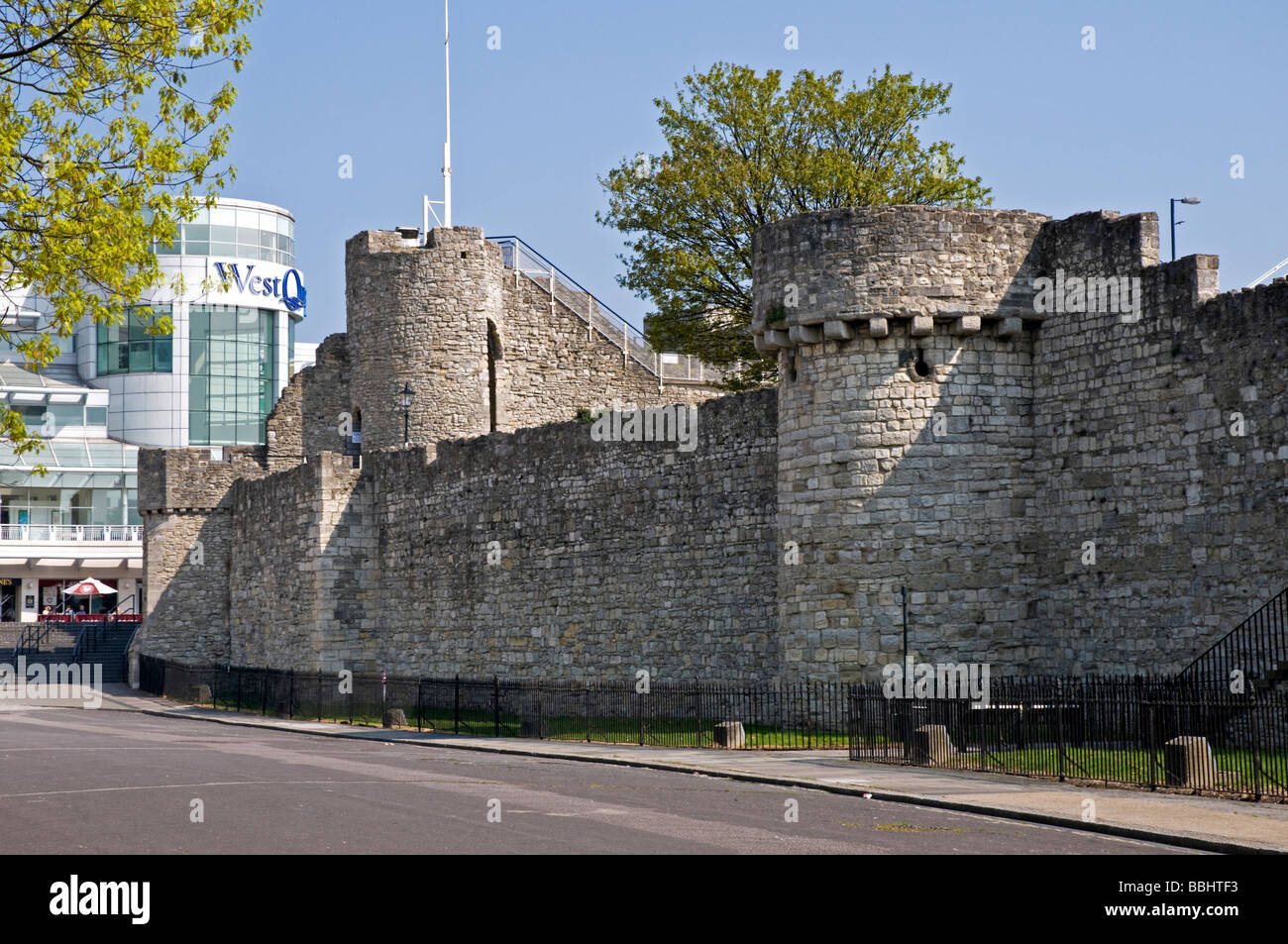 The medieval walls and towers of Southampton Castle contrast with the ...
