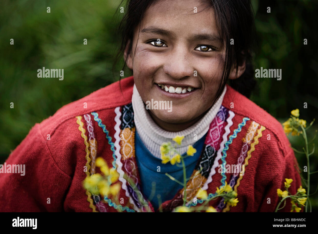 Cuzco, Peru; Peruvian girl smiling at camera Stock Photo - Alamy