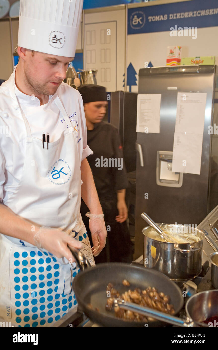 Busy chef in kitchen Stock Photo - Alamy