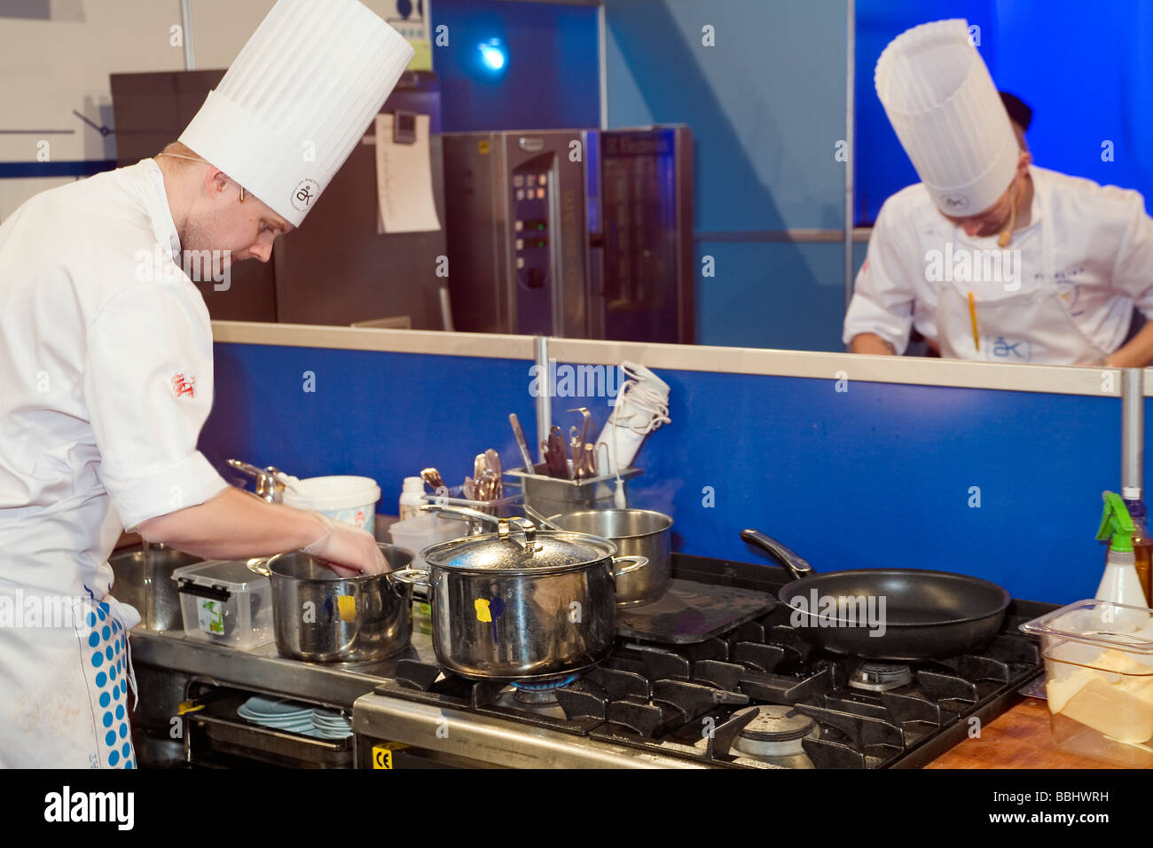 Busy chef in kitchen Stock Photo - Alamy