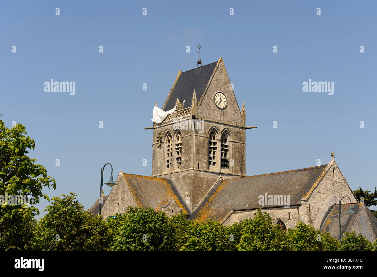 D Day US parachutist John Steele on the church at Sainte Mere Eglise ...