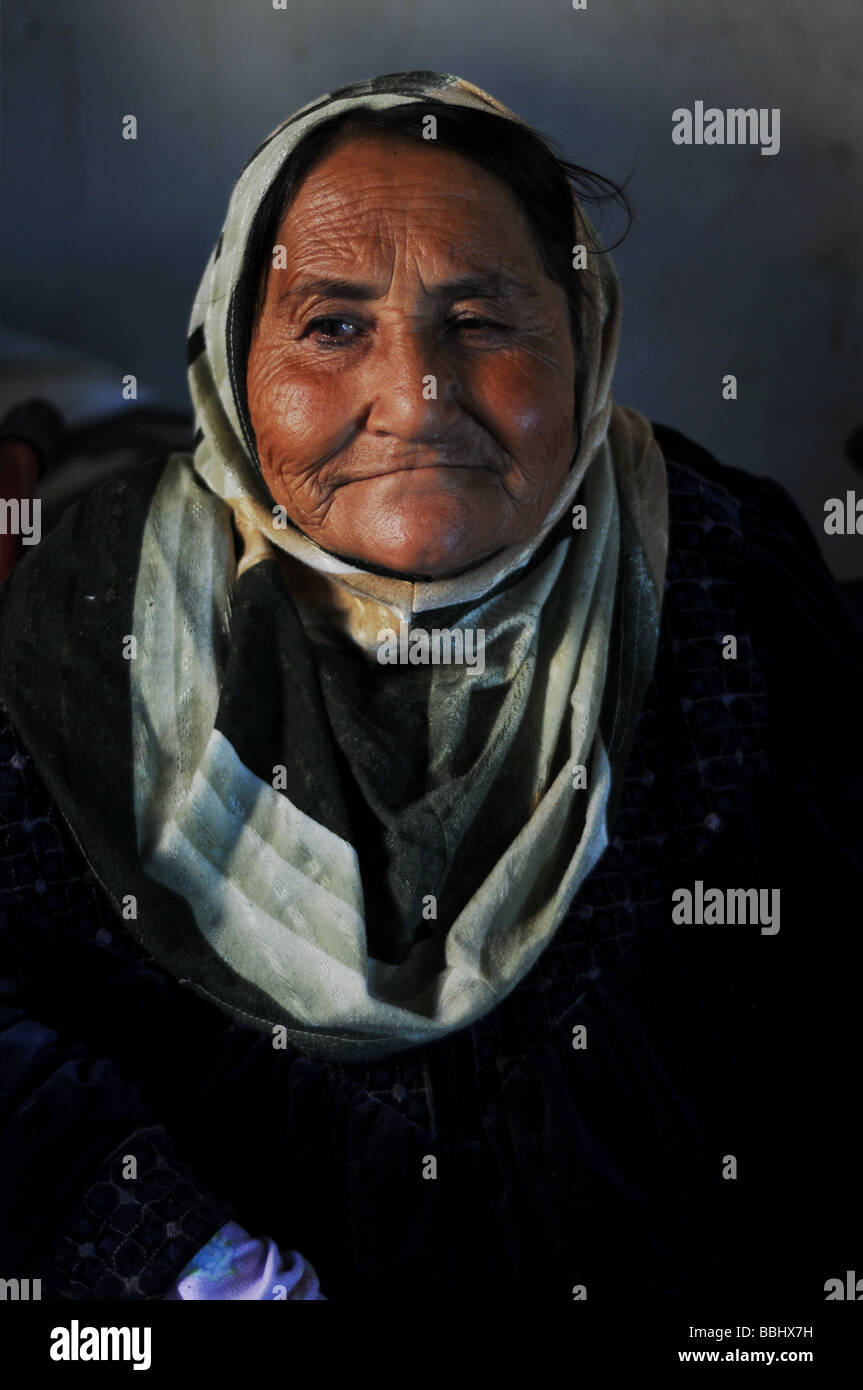 An old Palestinian lady sits in her home in Beit Hanina, Jerusalem. Her ...