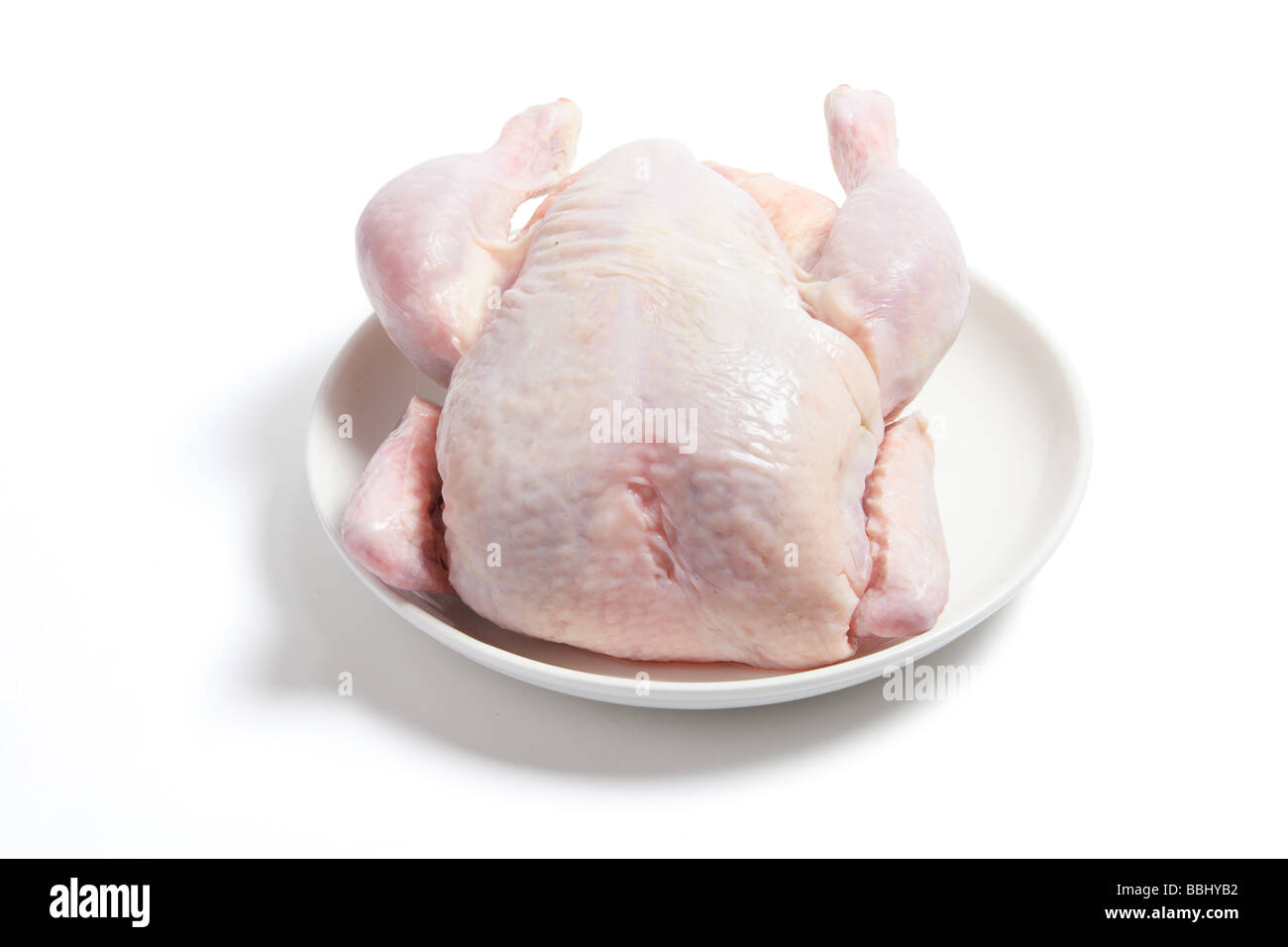 Raw Chicken on Plate Stock Photo - Alamy