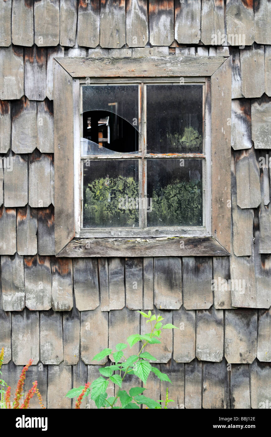 Broken window in Patagonia Stock Photo - Alamy