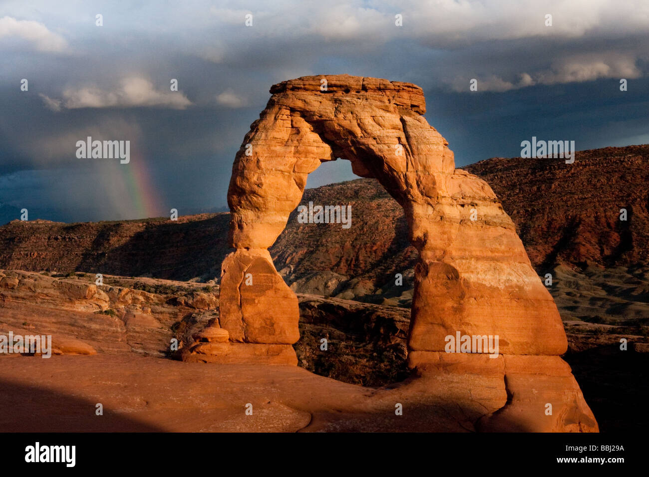Delicate Arch with rainbow in backround, moab Utah USA Stock Photo - Alamy