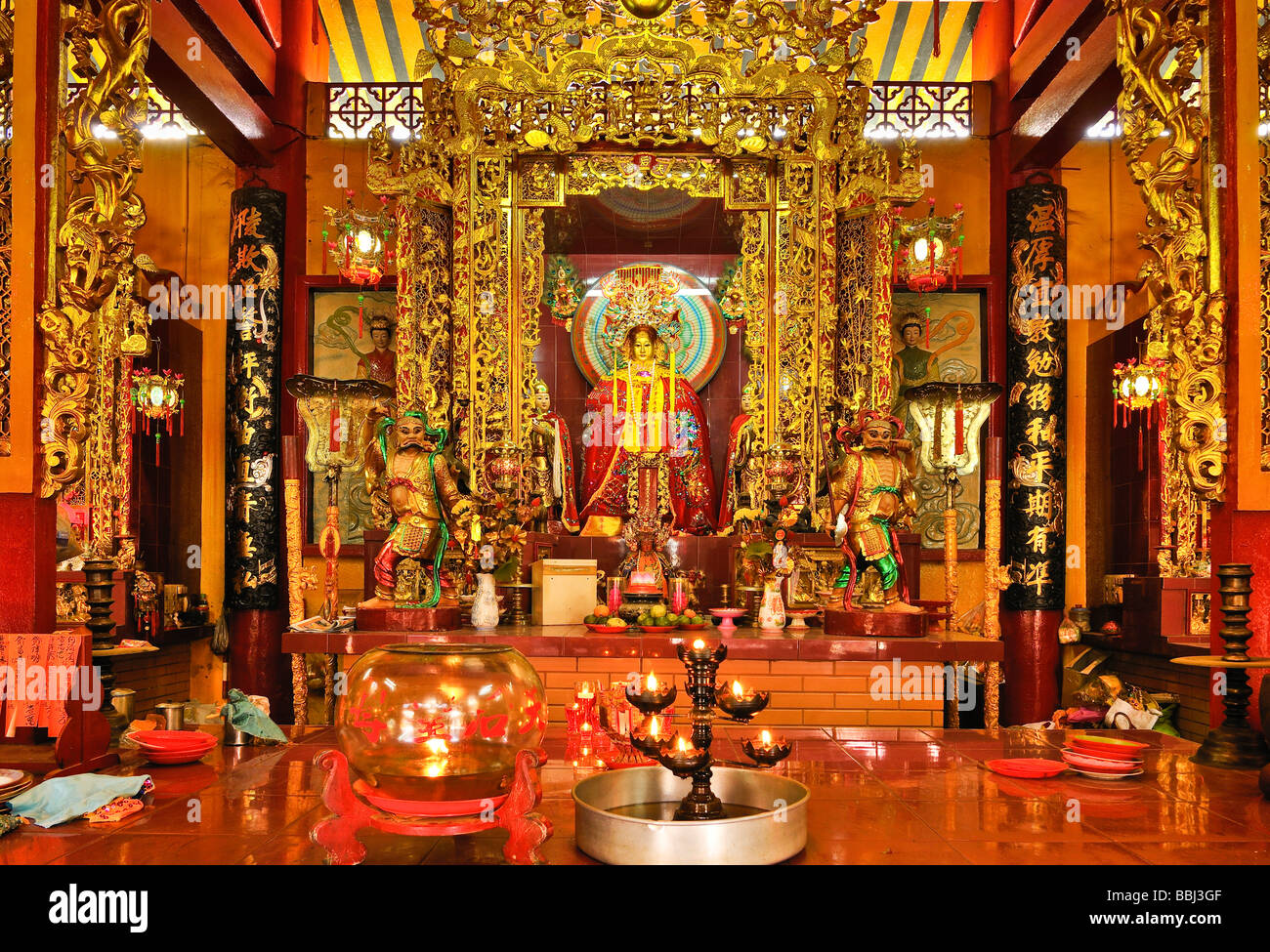 Deity at the magnificent and gold adorned altar, Quan Am Pagoda, Ho Chi ...
