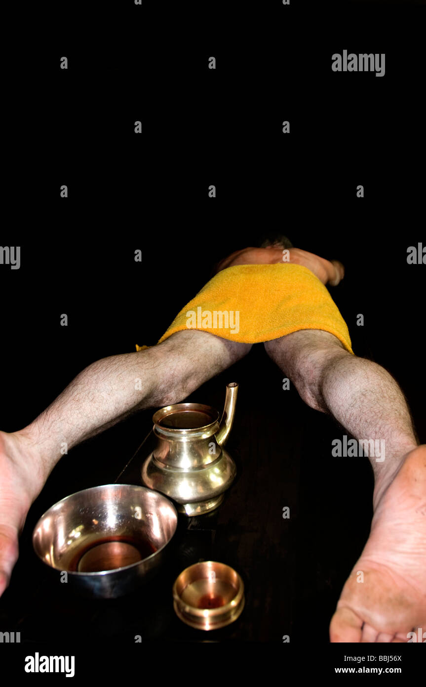 Young Man receiving an Ayurveda therapy, Ayurvedic massage treatment ...