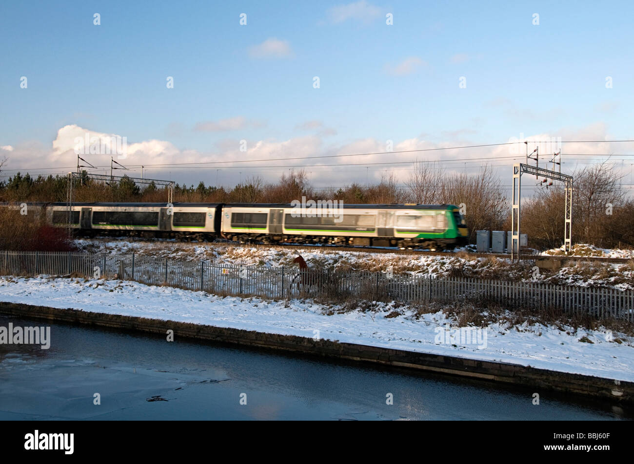 class 170 electric train in the west midlands in london midland livery ...