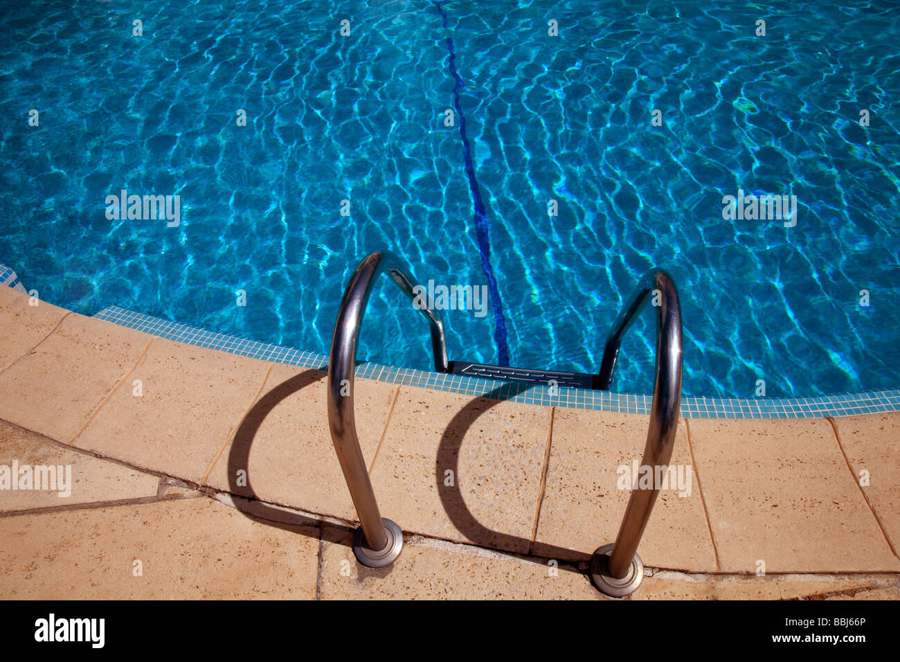 swimming pool blue water detail in summer time Stock Photo - Alamy