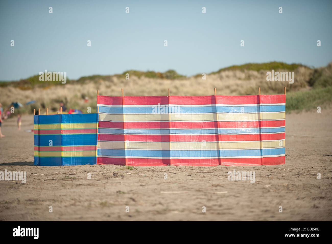 Plastic Windbreak offering shelter and privacy on the beach Poppit ...