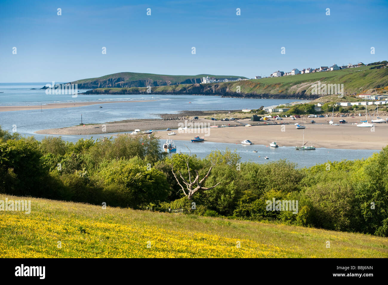A view Gwbert village on the cliffs near mouth of the Teifi river ...